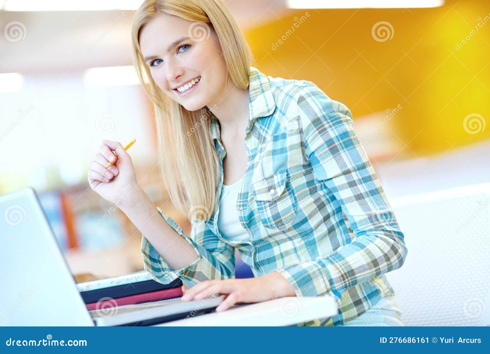 She Has a Bright Future Ahead of Her. Attractive Female Student Working ...