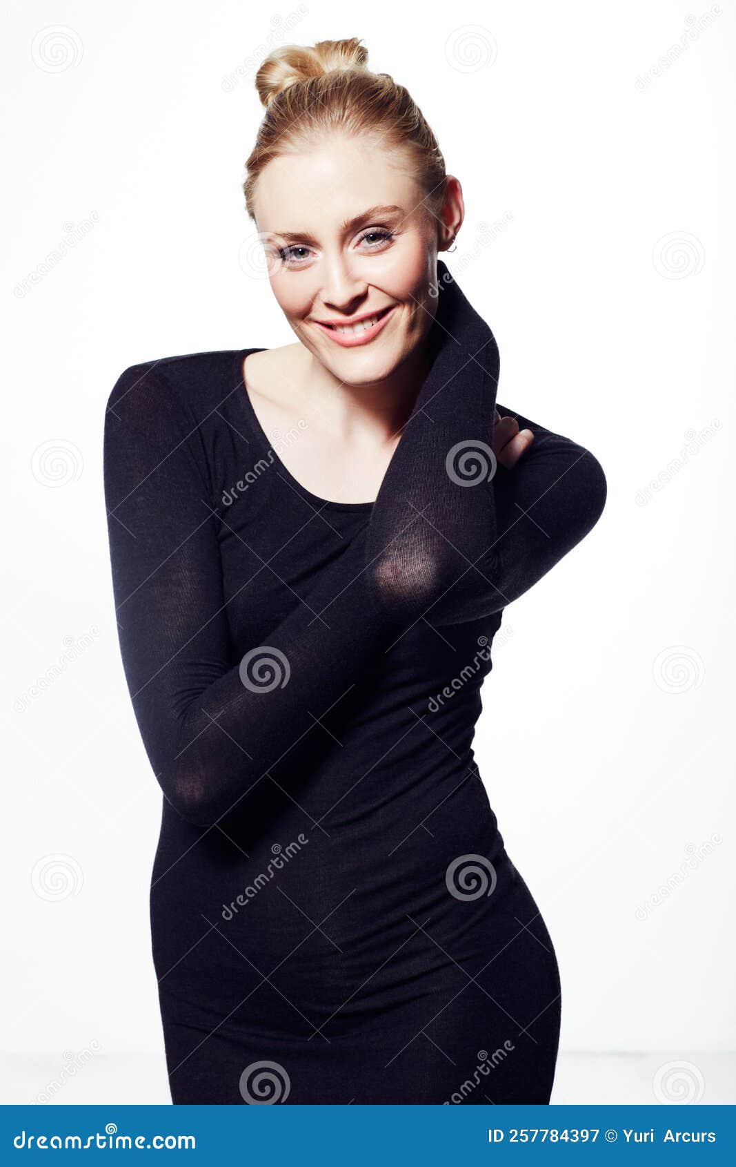 She Has an Easy-going Style..Studio Shot of an Attractive Model Smiling ...