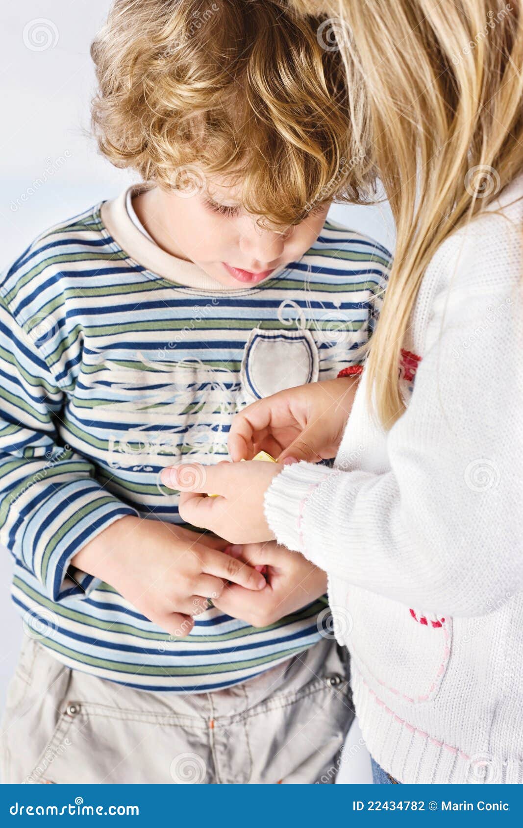 She Has Something in Her Hand Stock Photo - Image of game, happy: 22434782