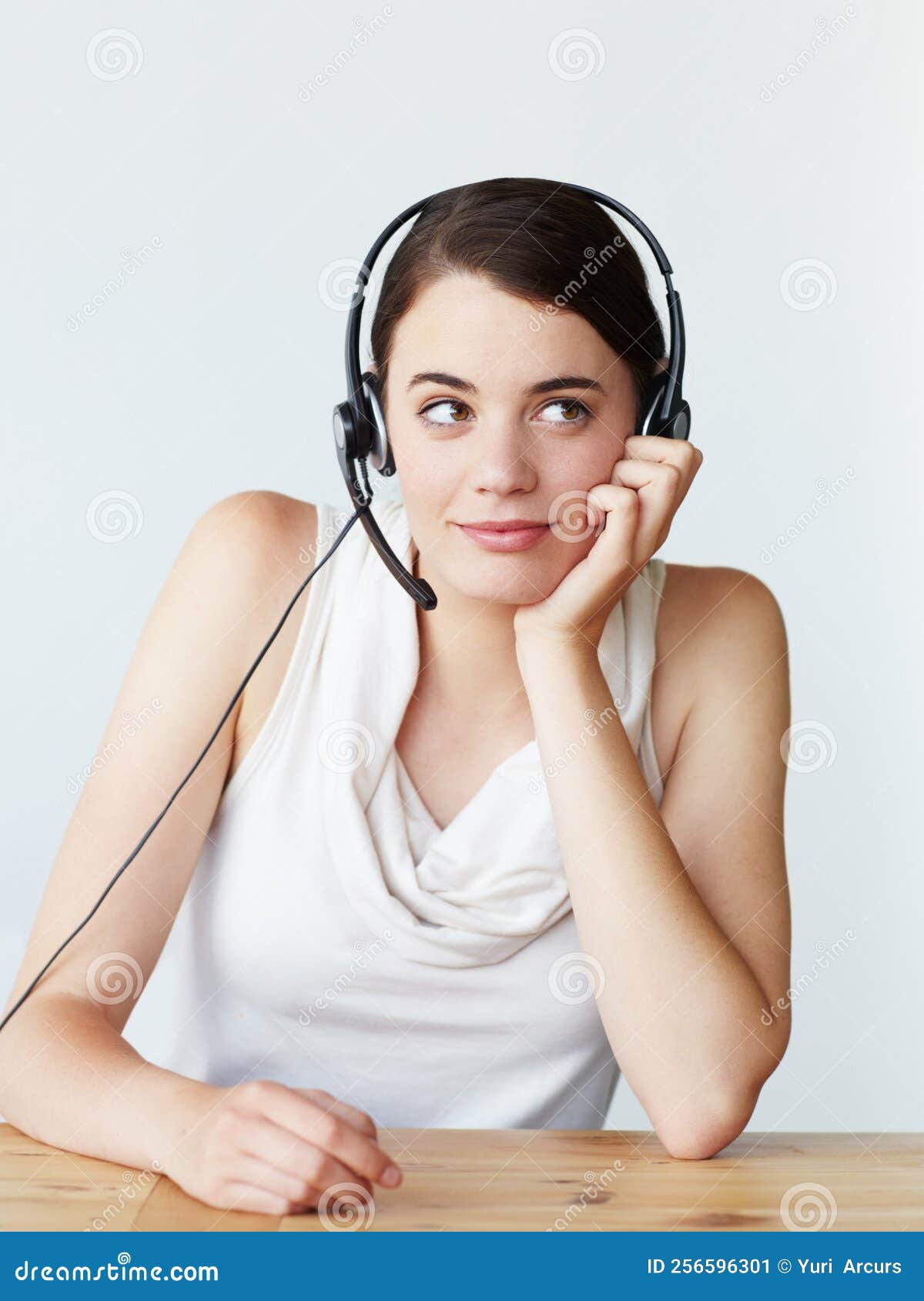 She Has Time To Daydream. a Beautiful Young Customer Service ...