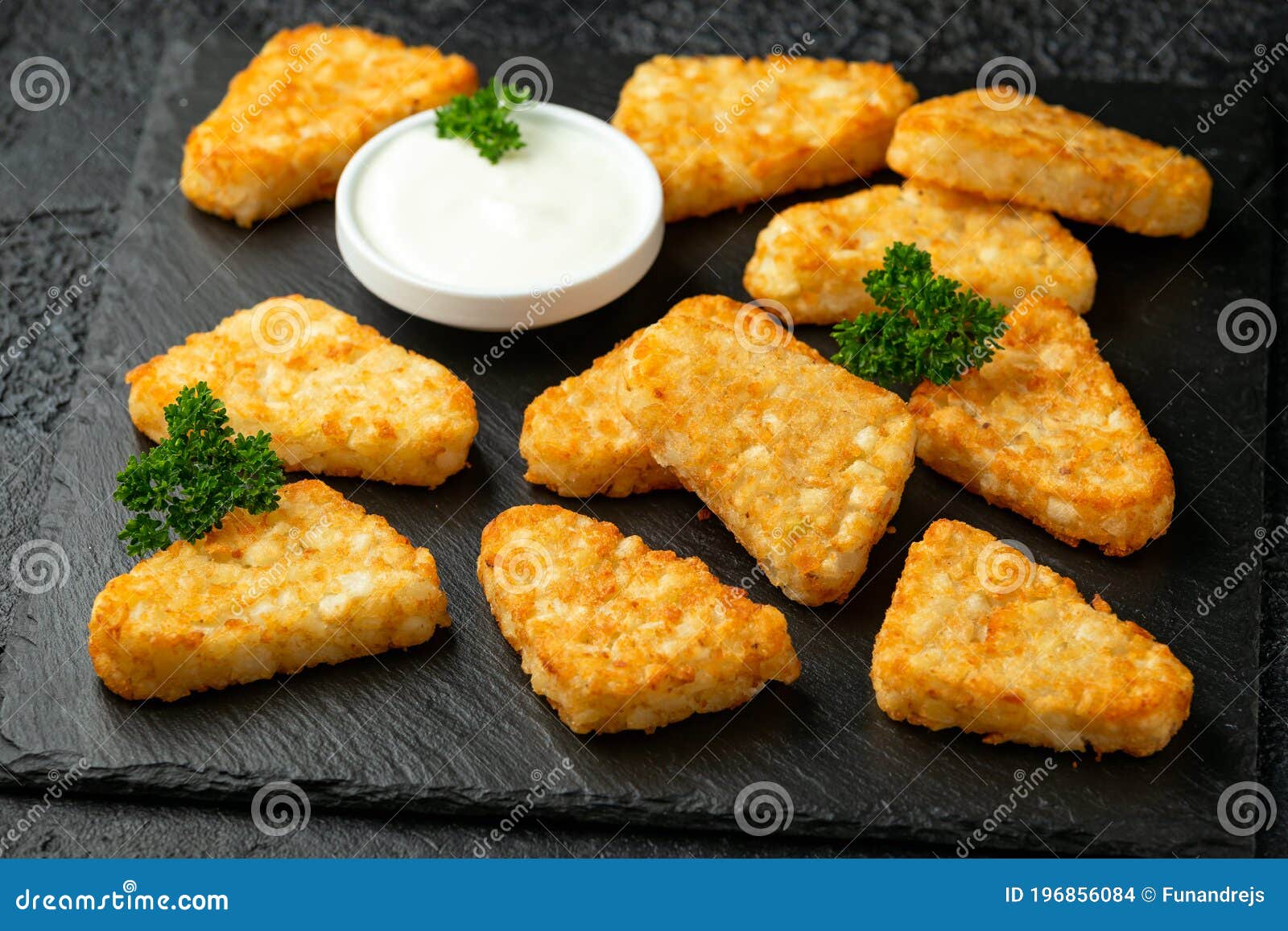 Hash Brown Potato Patties on Rustic Stone Board Stock Photo - Image of ...