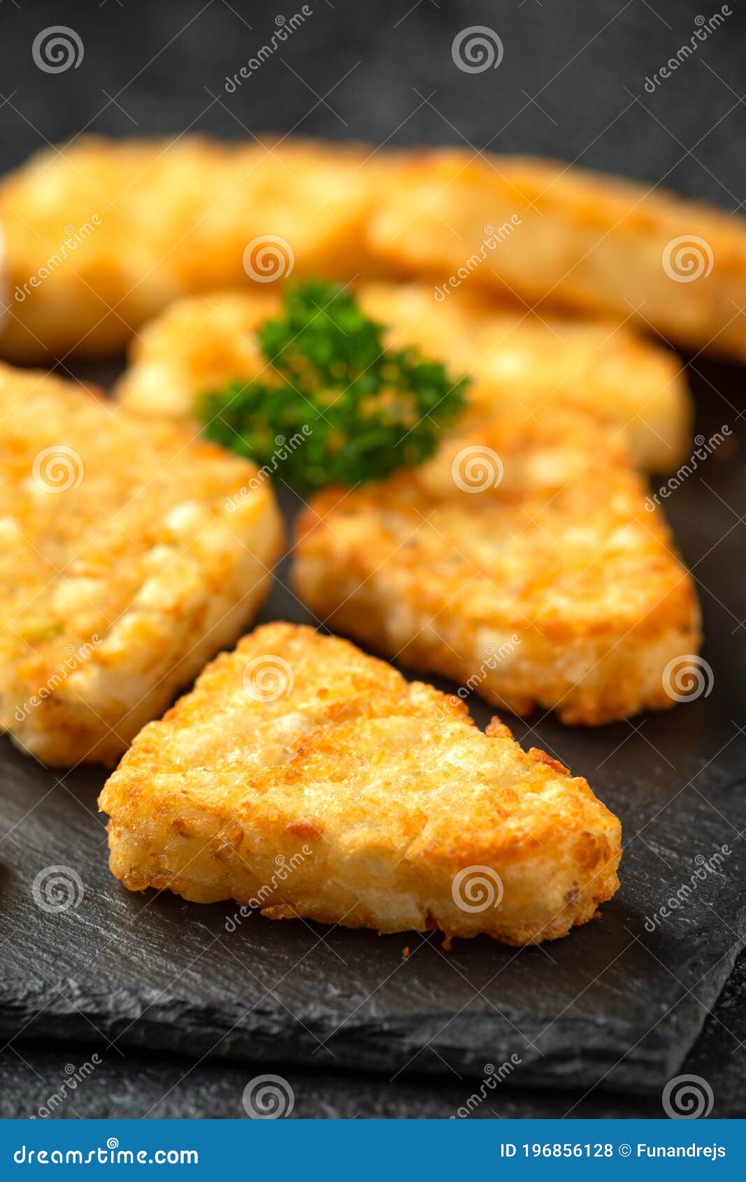 Hash Brown Potato Patties on Rustic Stone Board Stock Photo - Image of ...