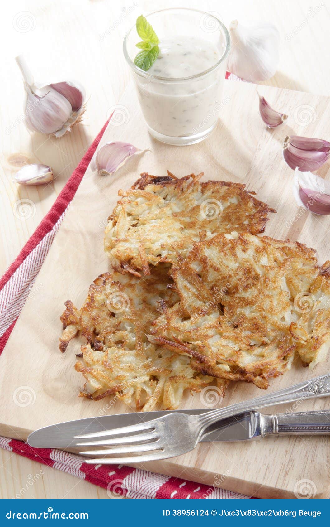 Hash Brown and Yogurt Dip on a Plate Stock Photo - Image of brown, fork ...