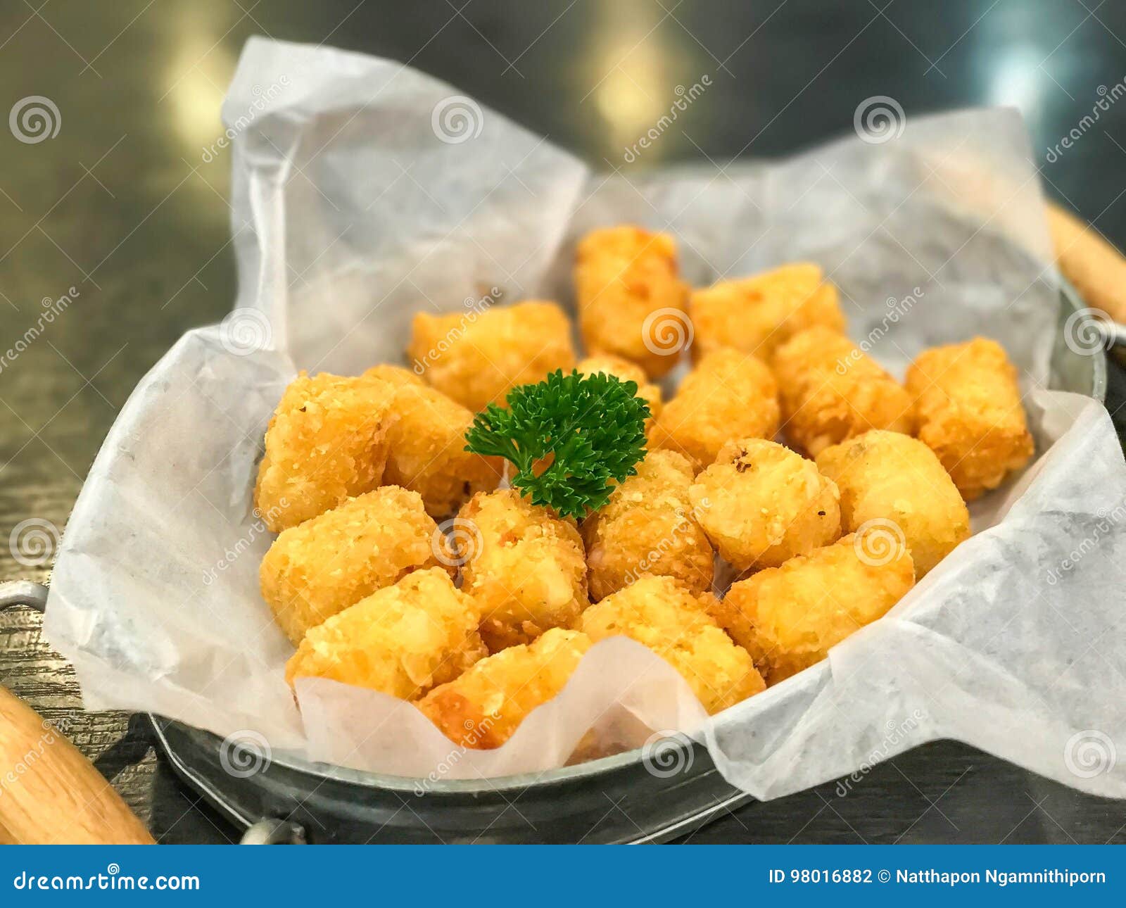 Hash browns in basket stock photo. Image of traditional - 98016882