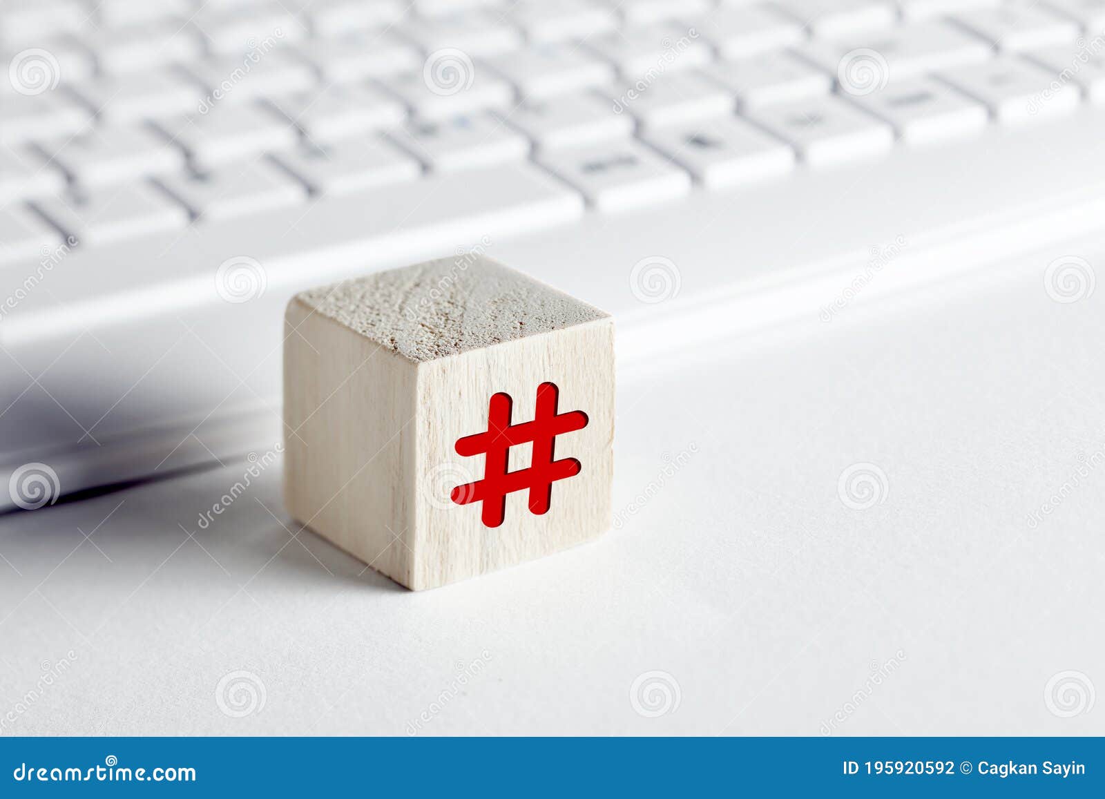 Hashtag Symbol on a Wooden Cube with Computer Keyboard Background on ...