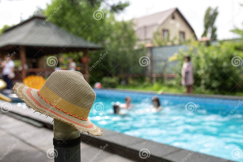 Hat on the Background of a Pool Party Stock Image - Image of isolated ...