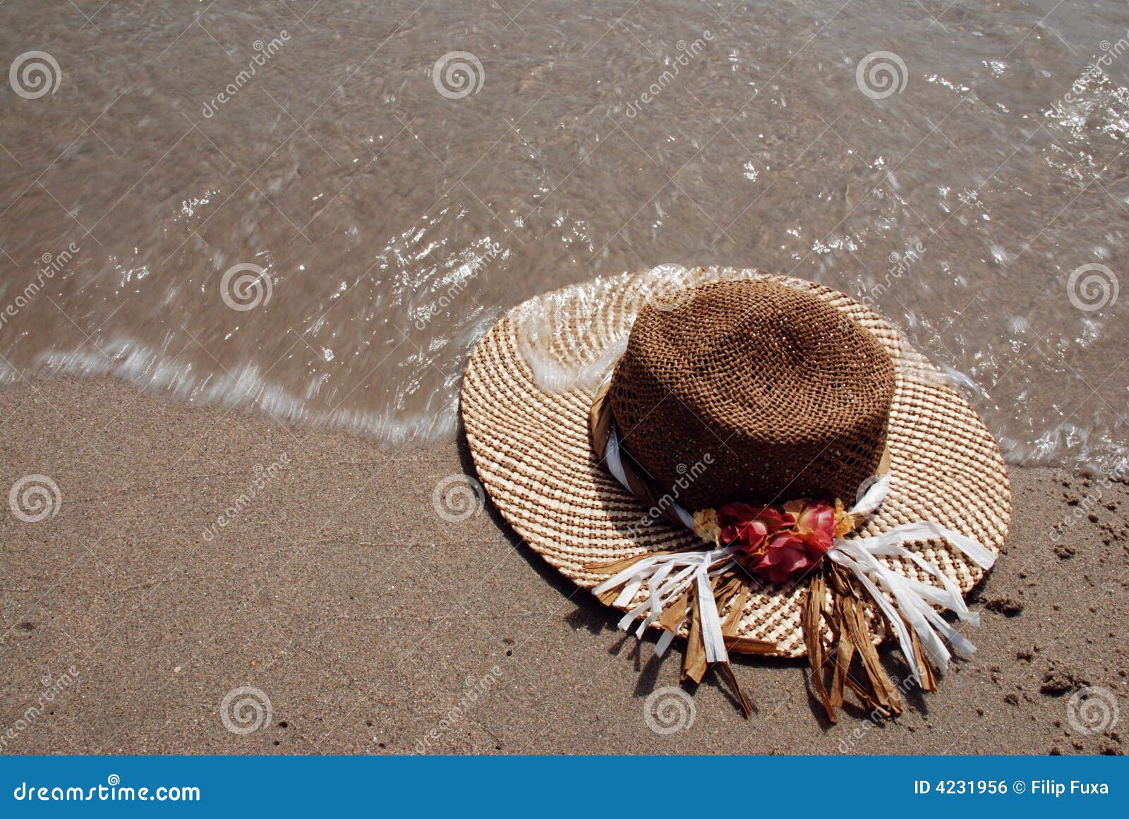 Hat on a beach stock photo. Image of sand, blue, rattan - 4231956