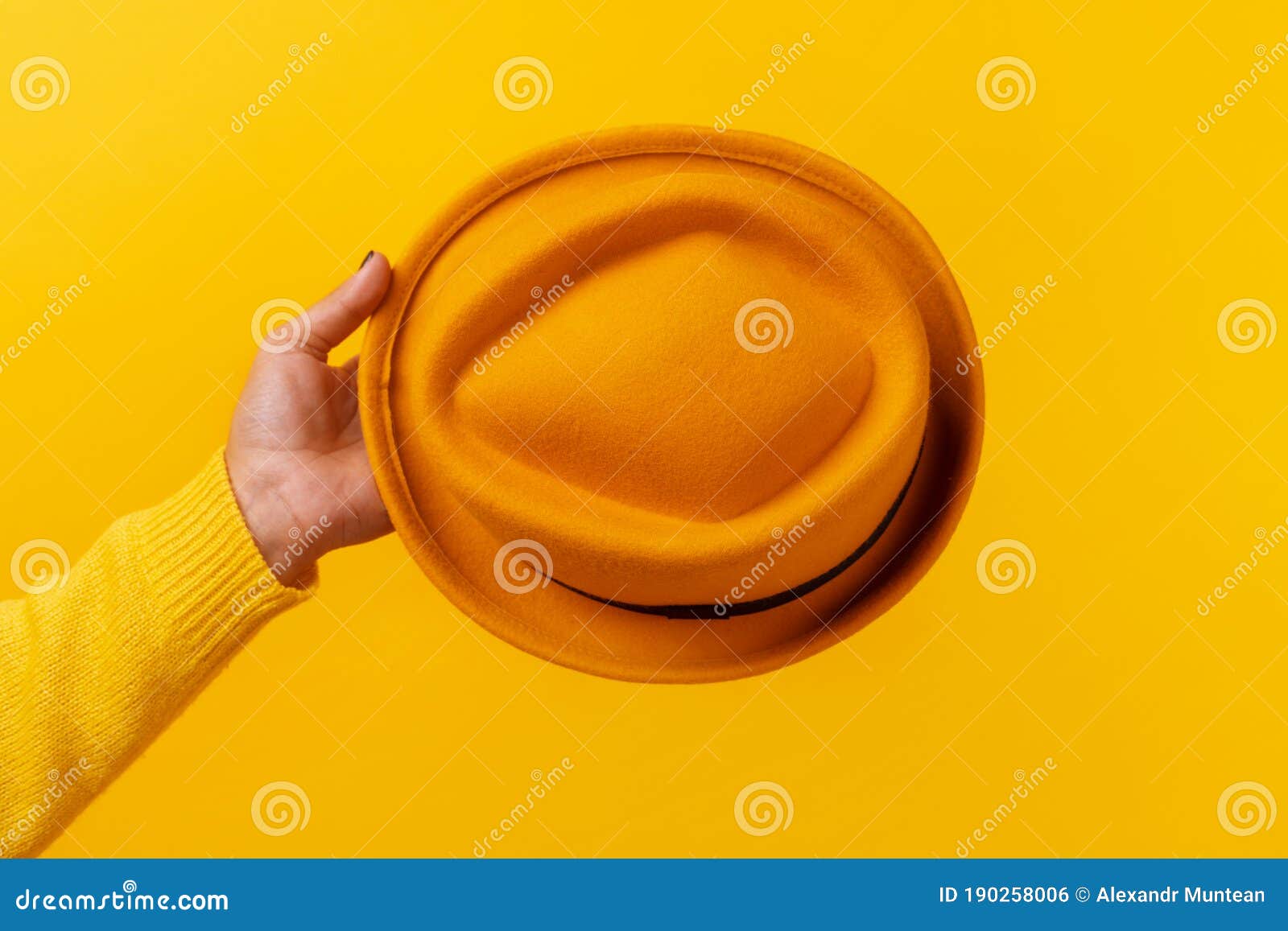 Hat in hand stock photo. Image of clothes, black, female - 190258006
