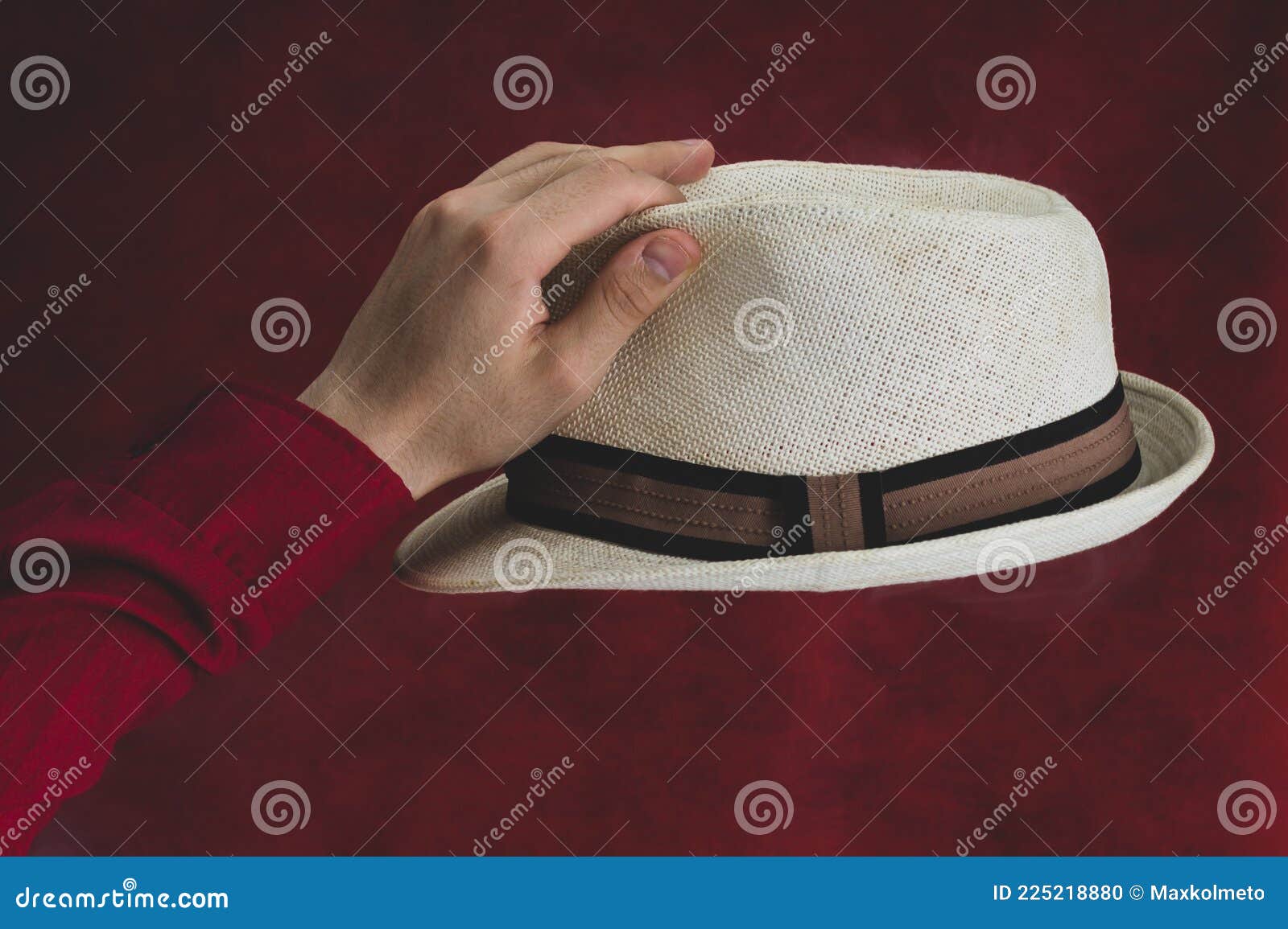 Hat in Male Hand on the Red Background. White Fedora Stock Photo ...
