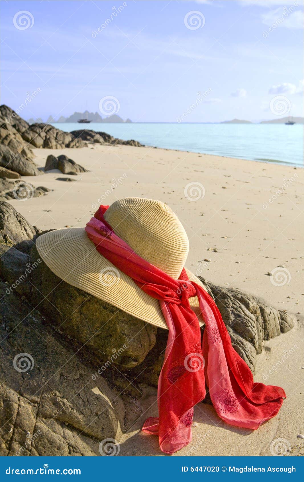 Hat on the Rocks at the Beach Stock Photo - Image of water, sunshine ...