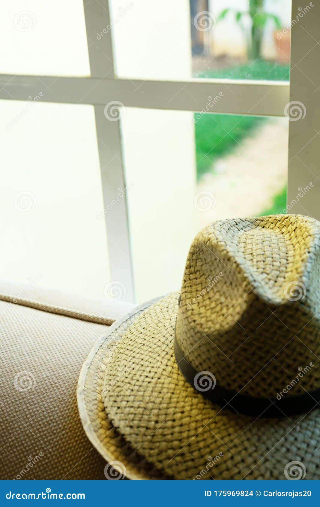 Hat at the window stock photo. Image of comfortable - 175969824