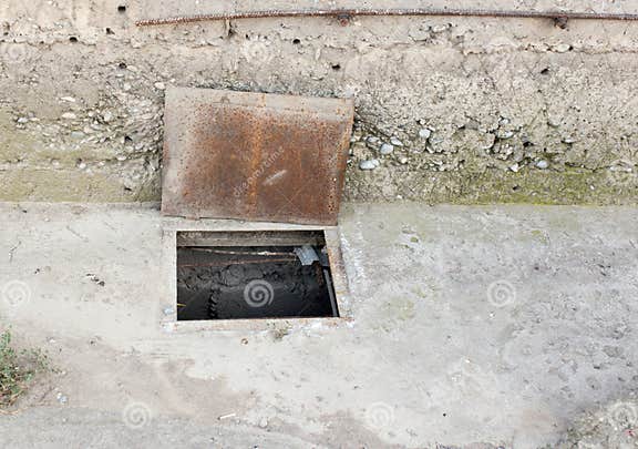Hatch in concrete stock image. Image of city, hole, round - 108717455