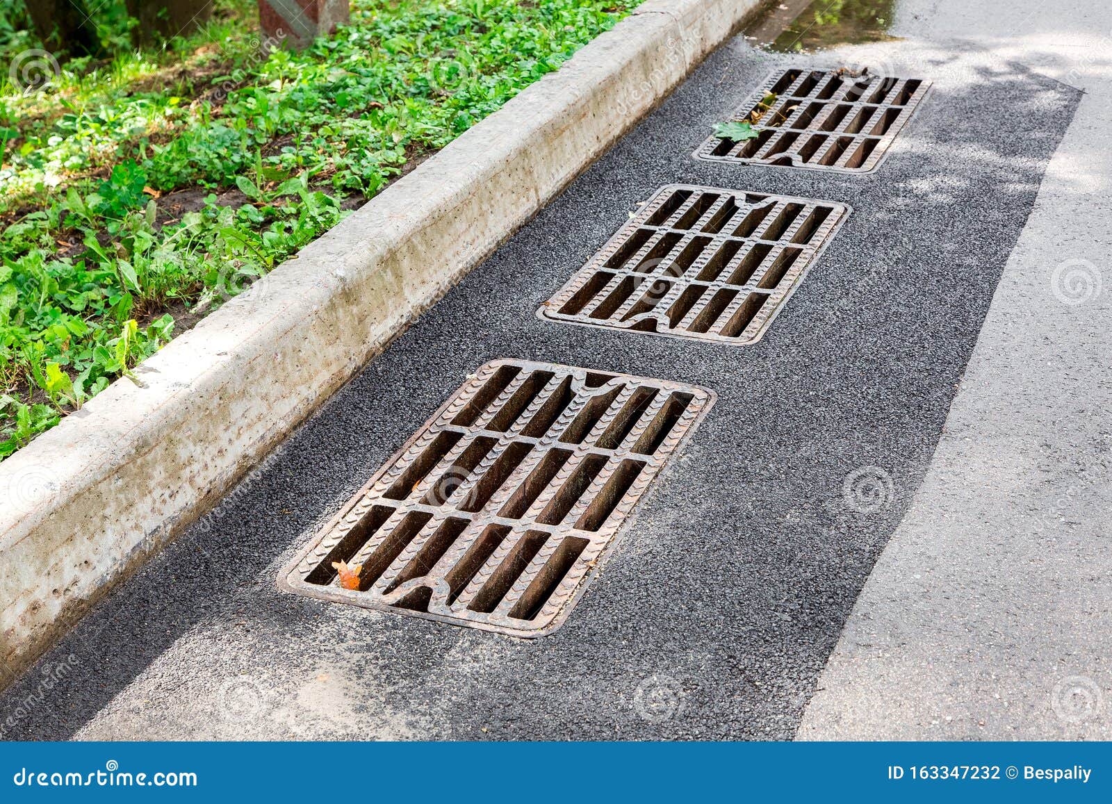 Hatch Storm System with a Rusty Grate. Stock Photo - Image of path ...
