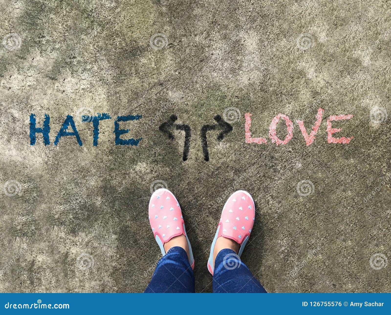 Hate or Love Arrow and Pink Slipper Shoe on Concrete Background Stock ...