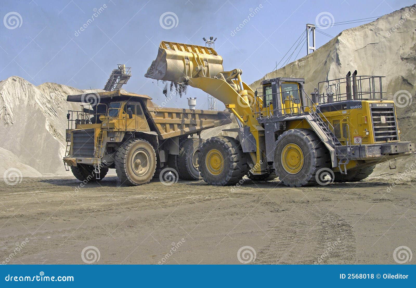 Hauler and loader action stock photo. Image of sand, roads - 2568018