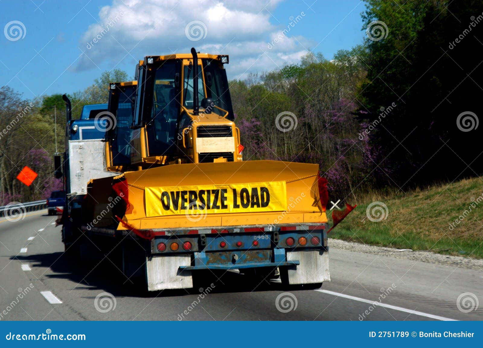 Hauling an Oversize Load stock image. Image of load, clouds - 2751789