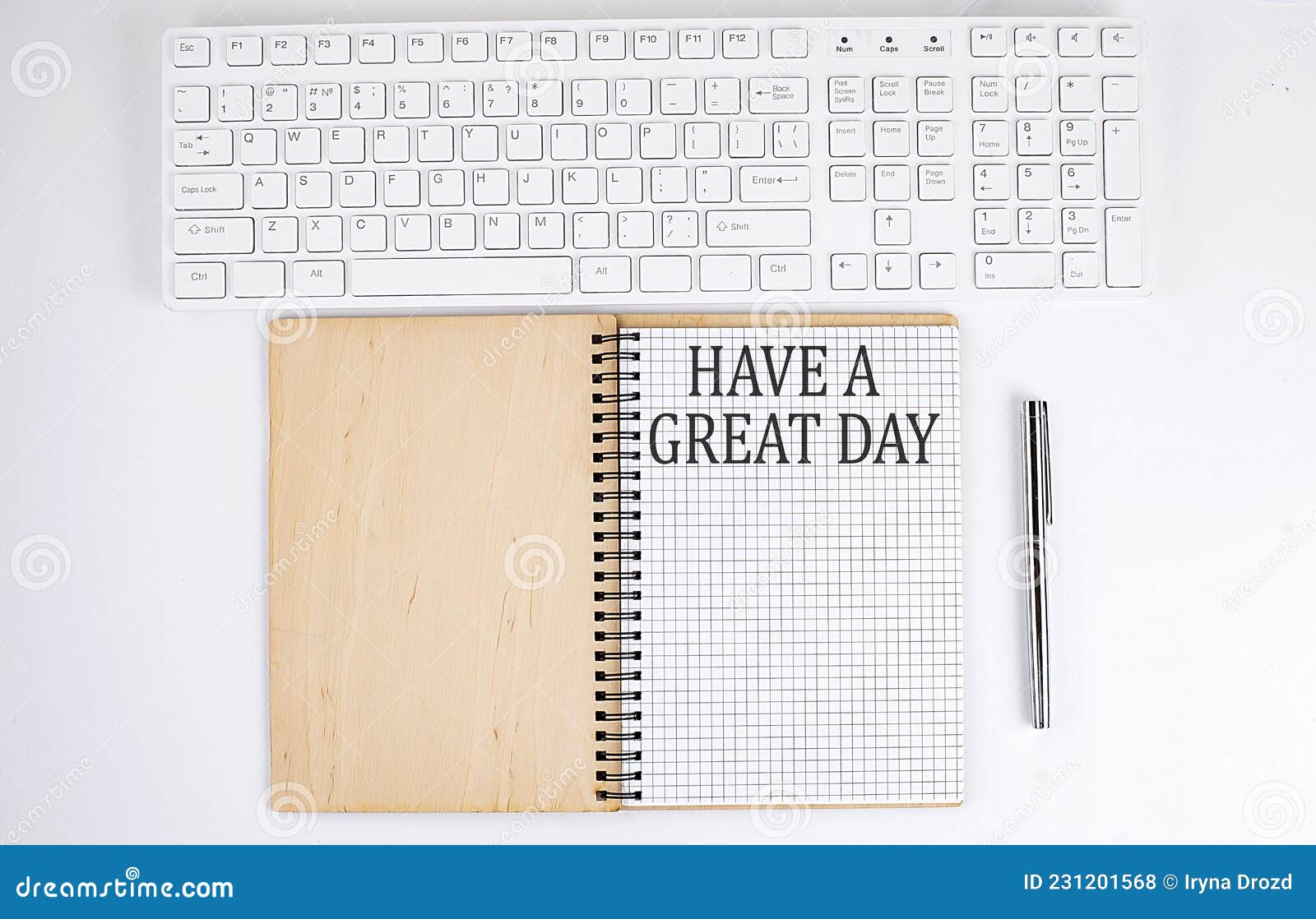 HAVE a GREAT DAY Text on the Notebook with Keyboard on White Background ...