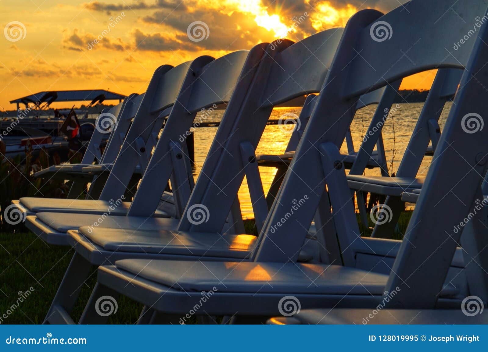 Have a seat stock image. Image of sunset, seat, chairs - 128019995