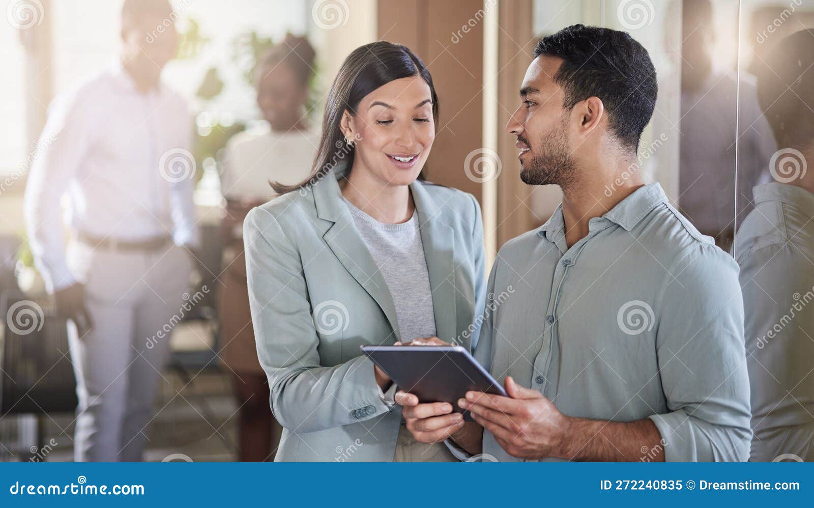 Have You Seen this Video. Two Coworkers Talking while Using a Digital ...