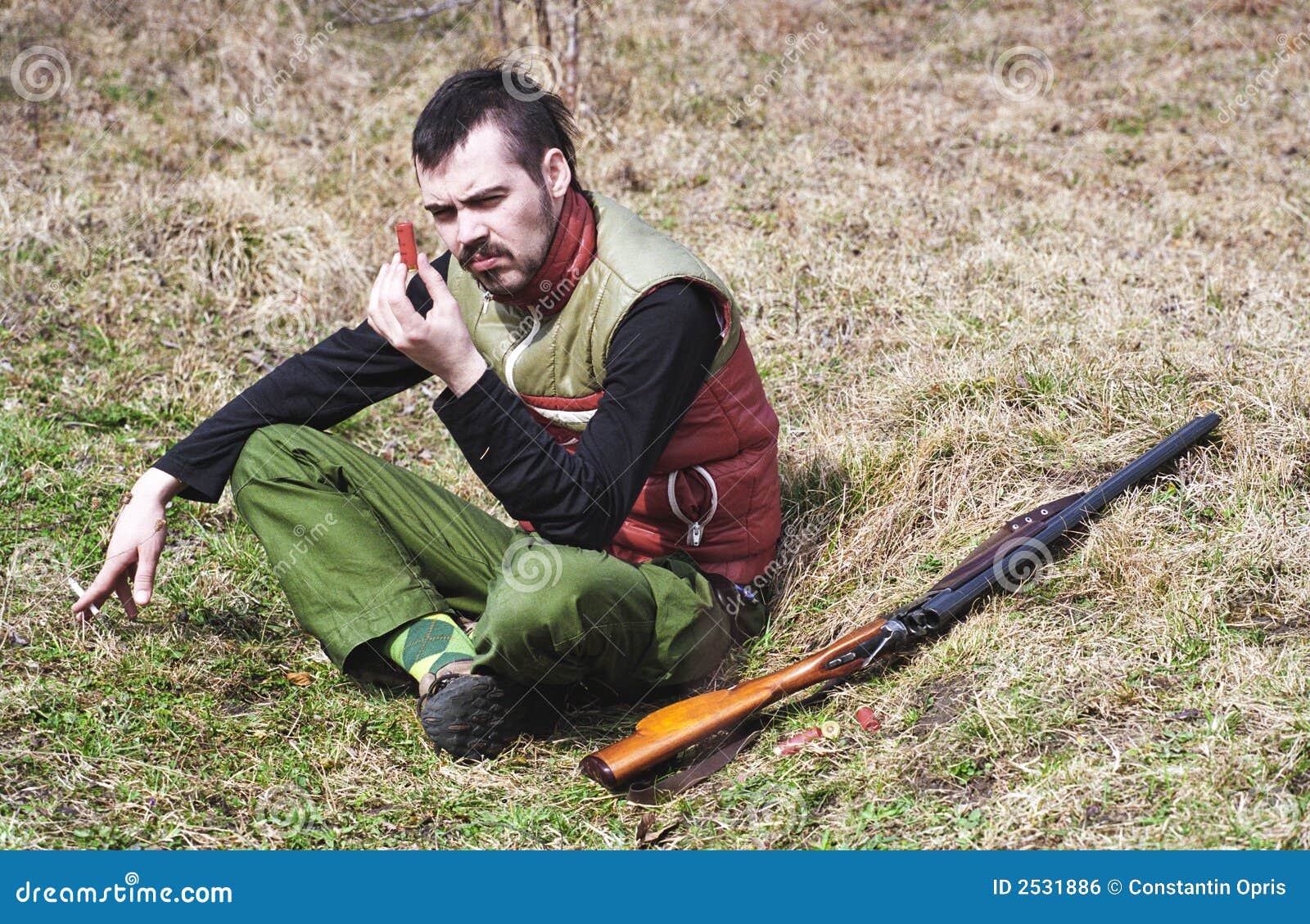 Having a break hunting stock photo. Image of checking - 2531886