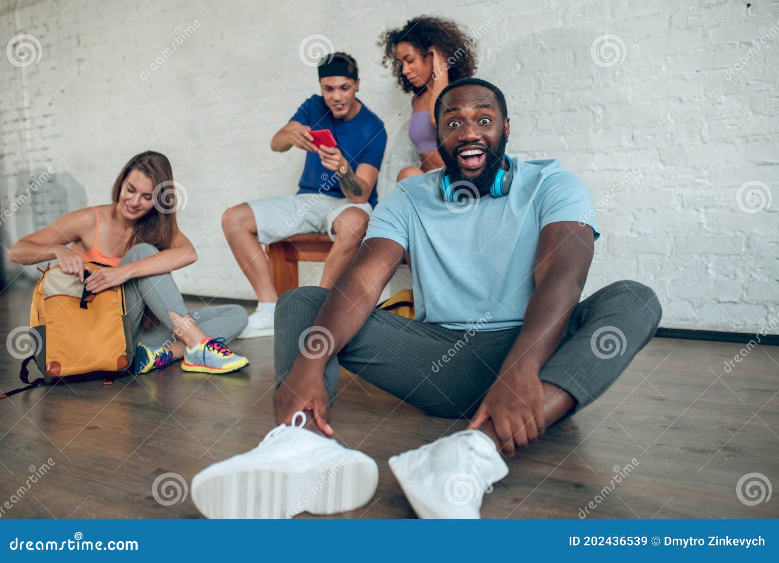 Smiling Dancers Having Rest after a Dance Class Stock Image - Image of ...