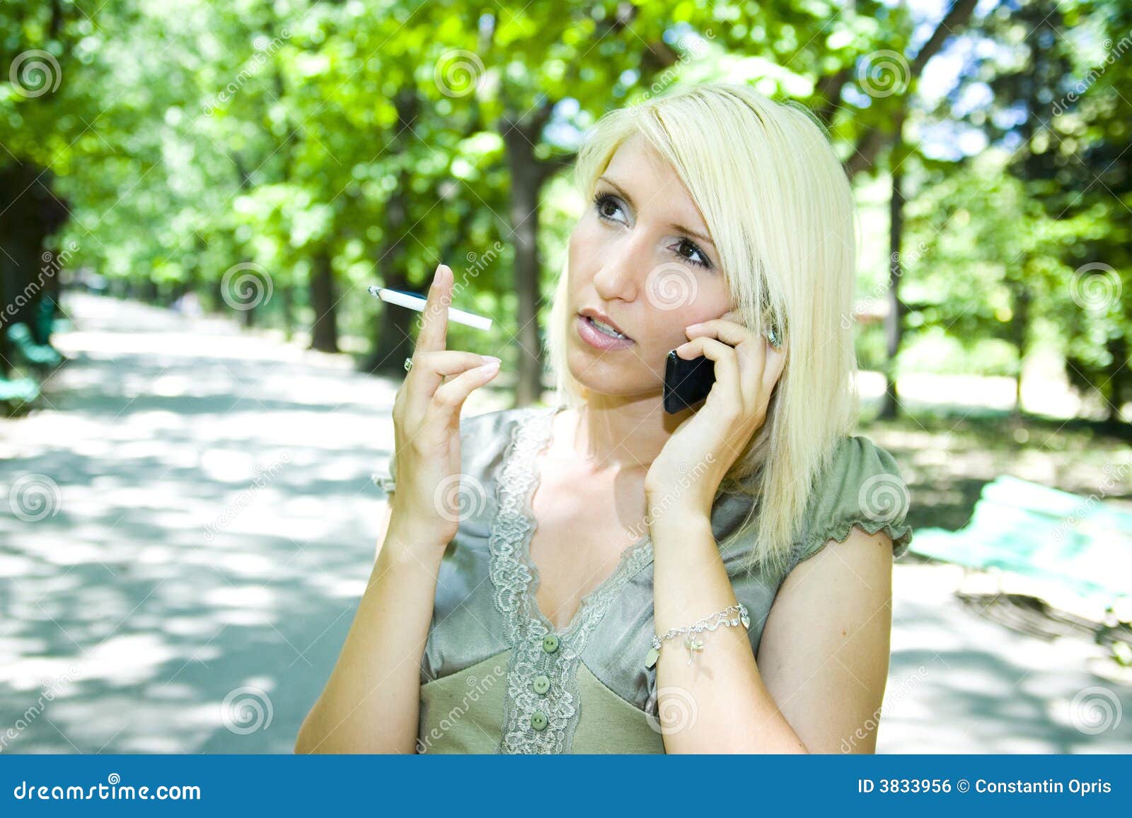 Having Cigarette Break in Park Stock Photo - Image of smokes, pretty ...