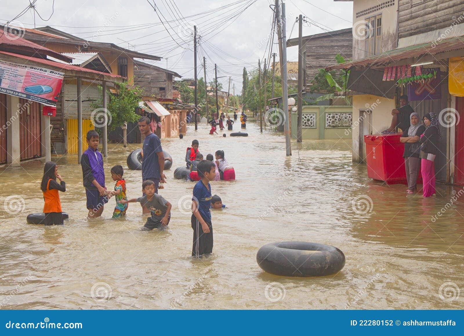 Having Fun in Flood Water editorial photography. Image of november ...