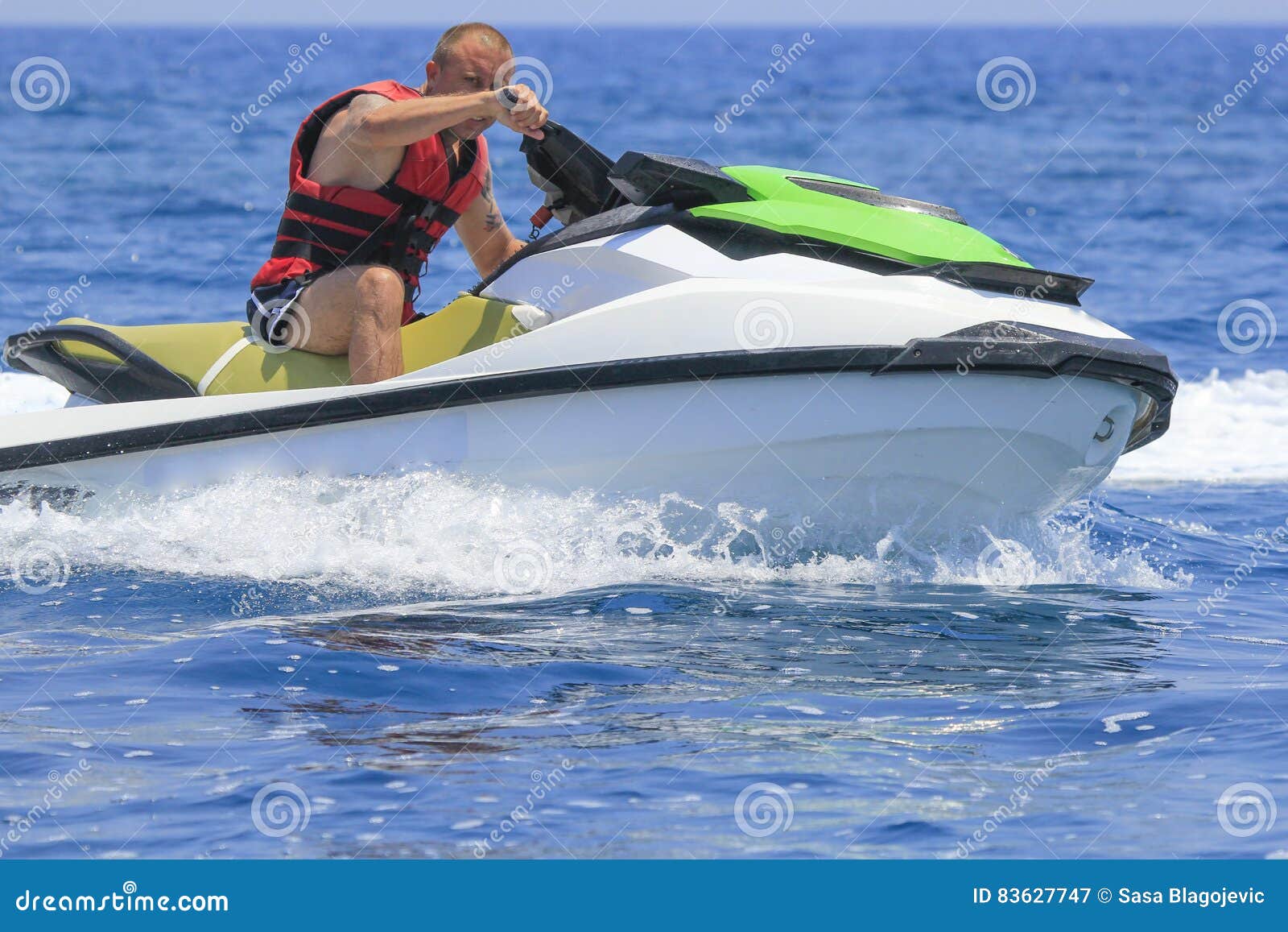 Having fun on a jet-ski stock image. Image of holiday - 83627747