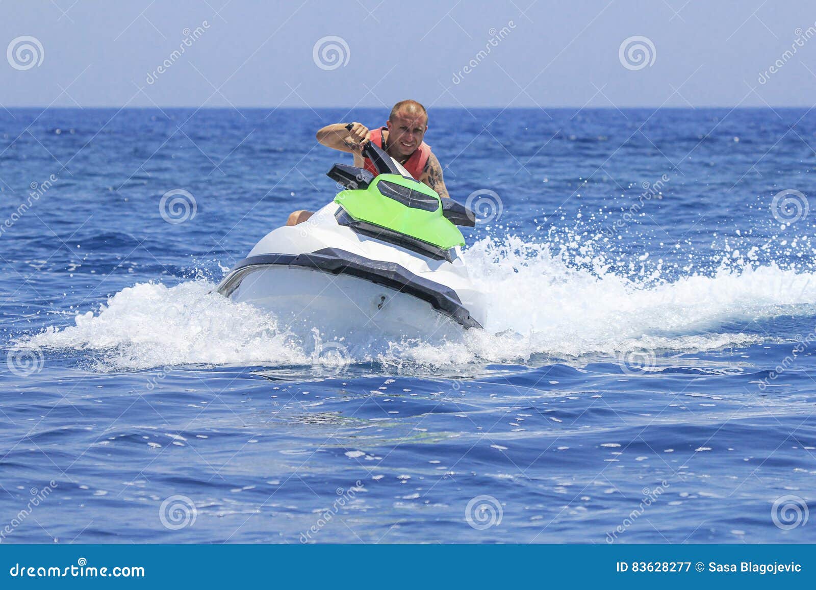 Having fun on a jet-ski stock image. Image of speed, sport - 83628277