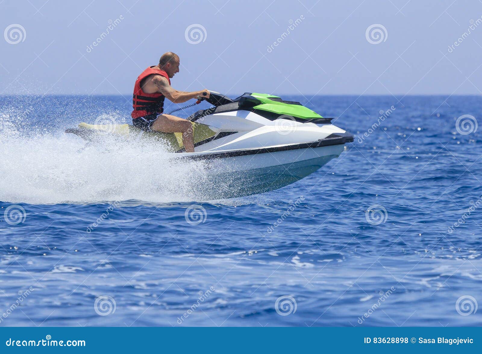 Having fun on a jet-ski stock photo. Image of summer - 83628898