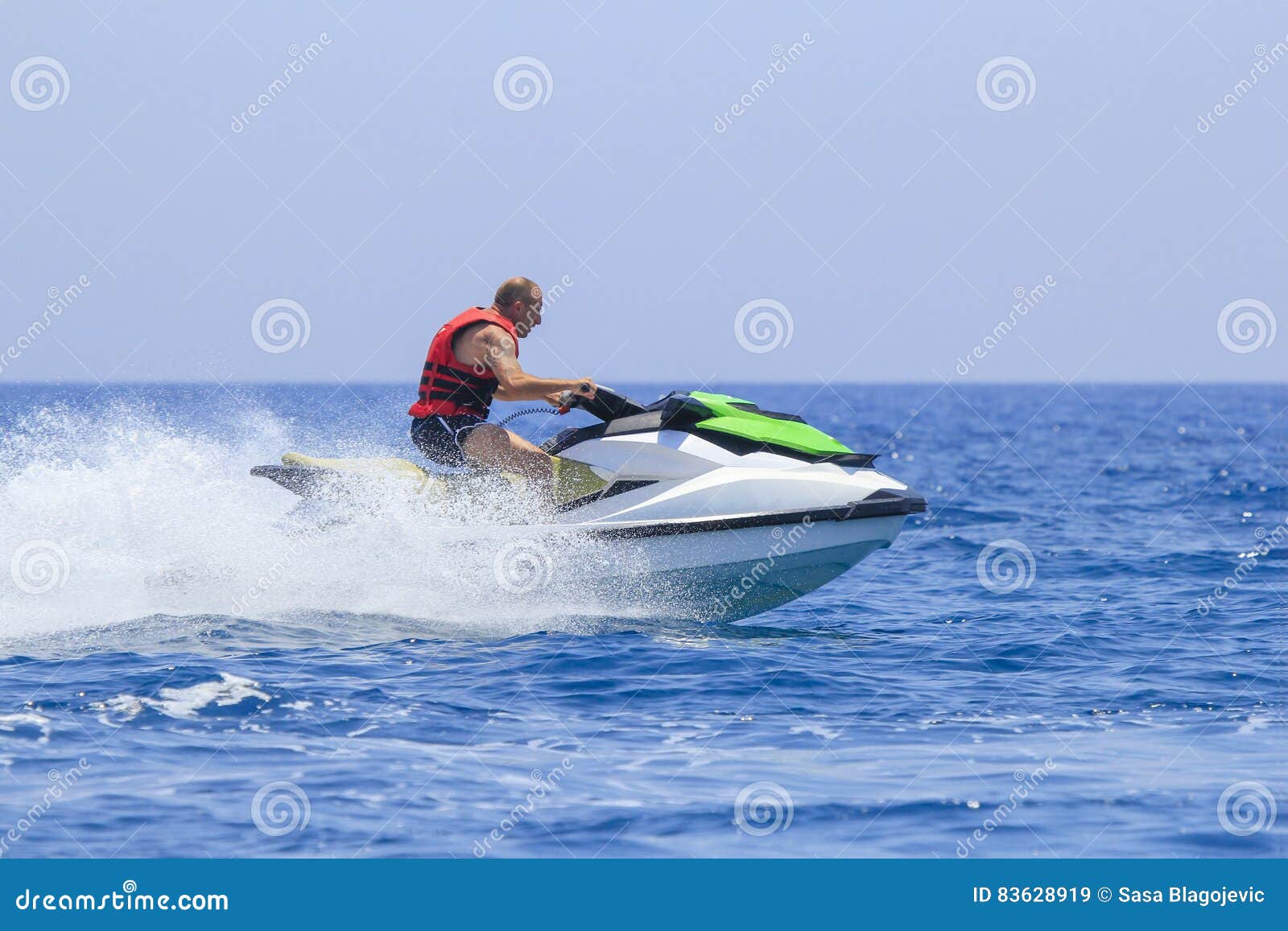 Having fun on a jet-ski stock image. Image of action - 83628919