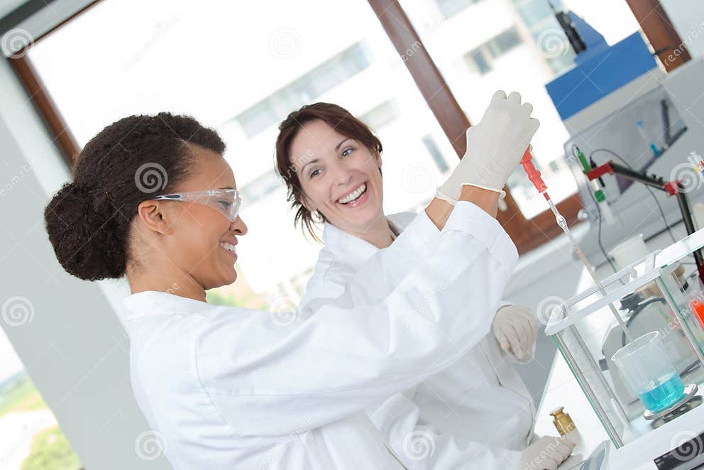Having fun in laboratory stock photo. Image of reaction - 335184596