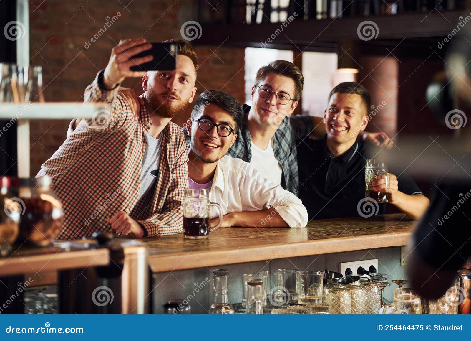 Having Fun. People in Casual Clothes Sitting in the Pub Stock Image ...
