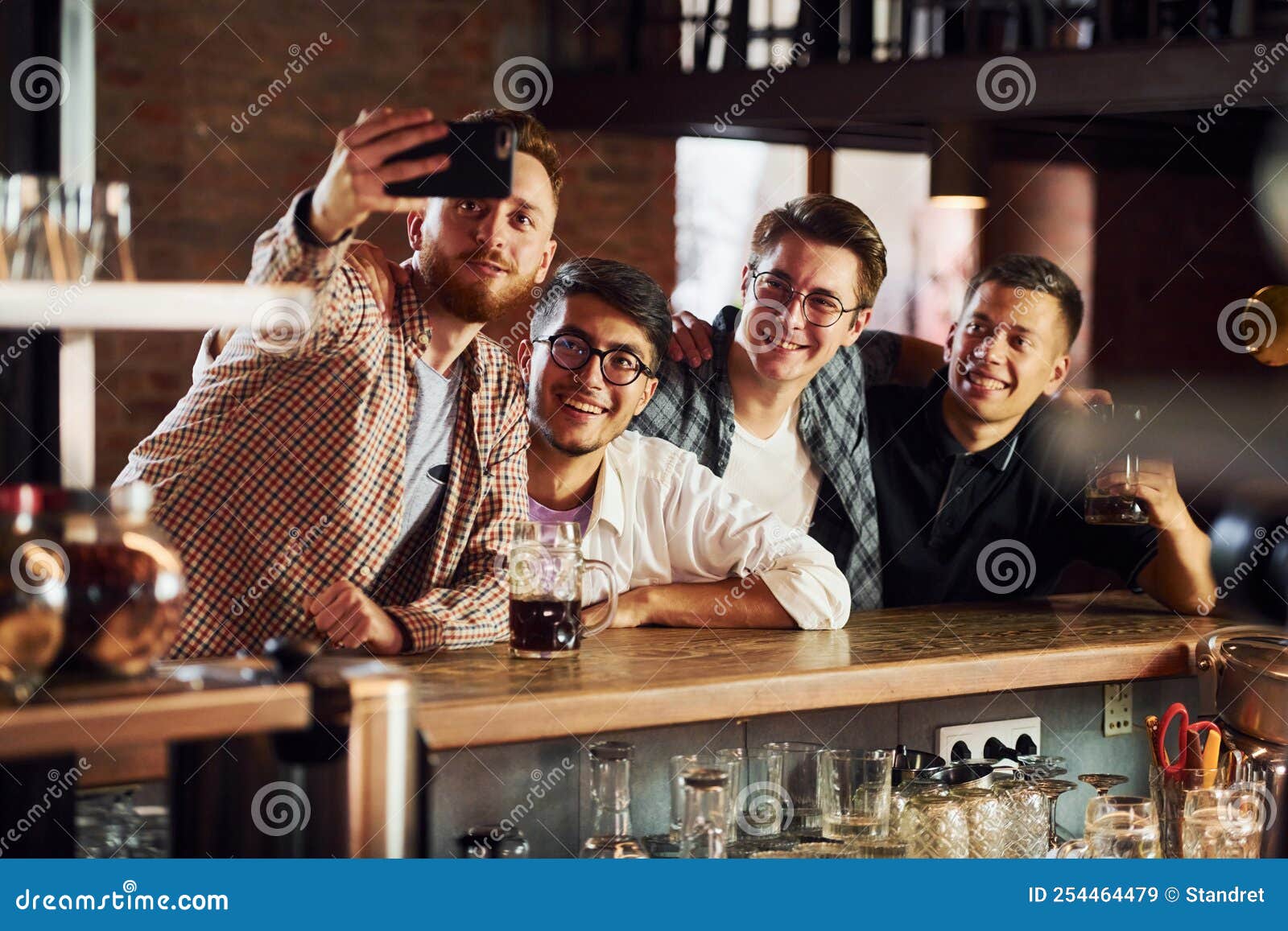 Having Fun. People in Casual Clothes Sitting in the Pub Stock Image ...