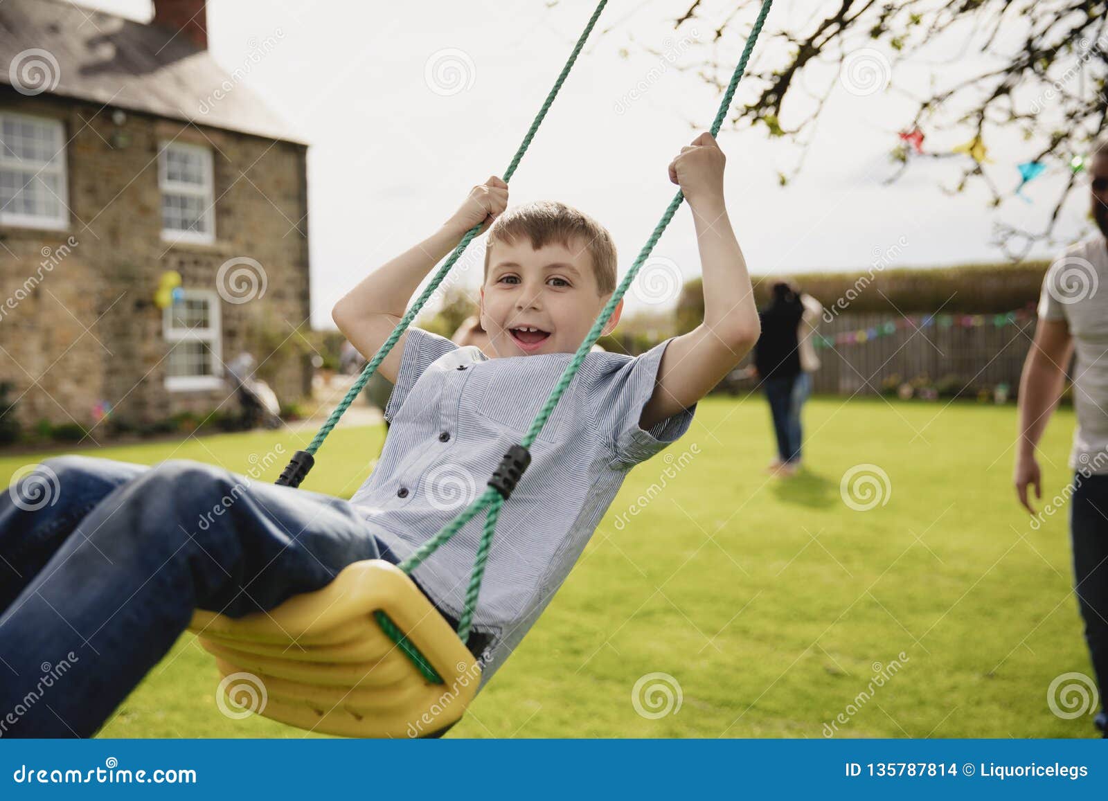 Having Fun on the Swing stock photo. Image of perspective - 135787814
