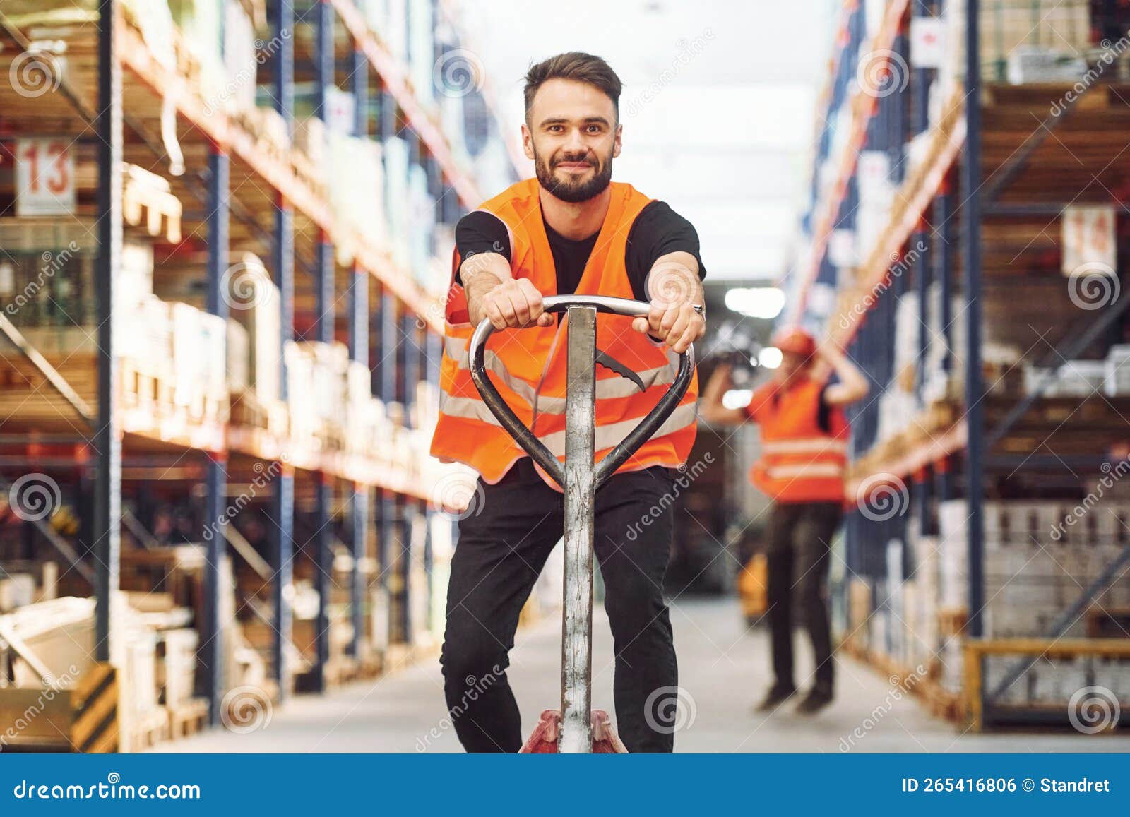 Having Fun by Using Trolley Platform. Two Storage Workers is in the ...