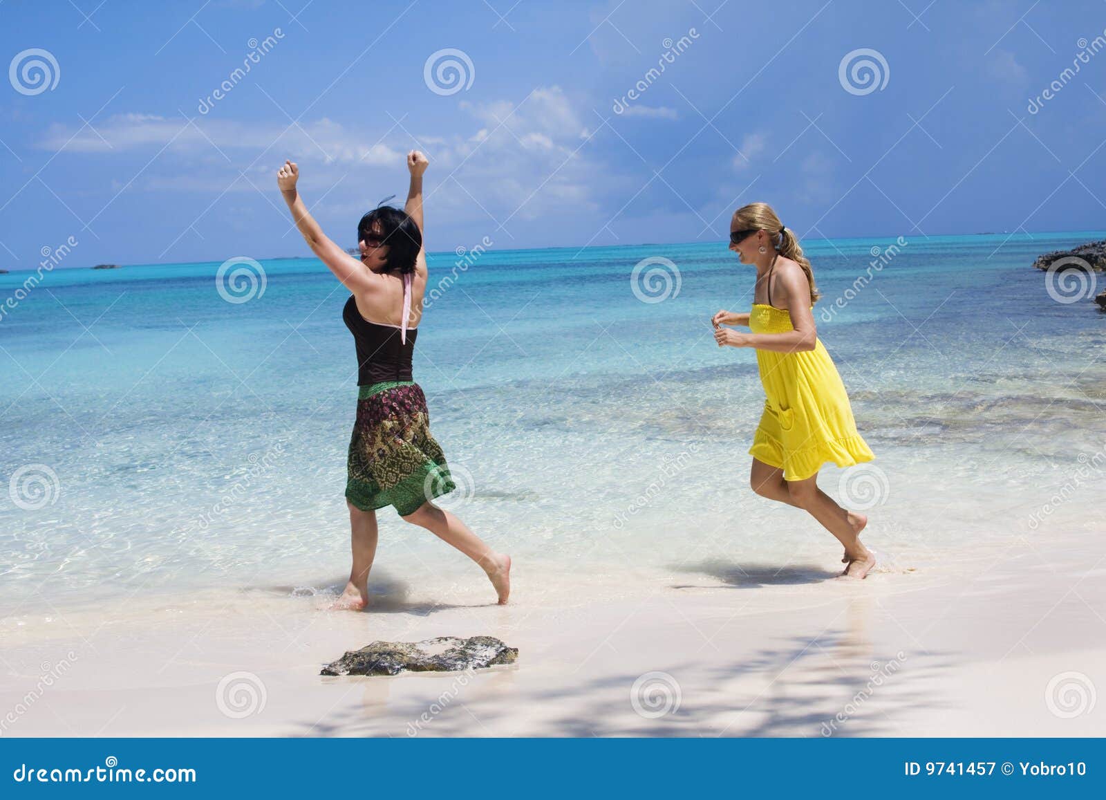 Having a Fun Vacation stock image. Image of friends, raised - 9741457
