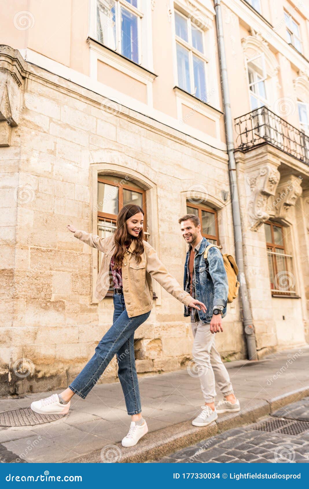 Having Fun while Walking on Sidewalk Stock Photo - Image of outside ...
