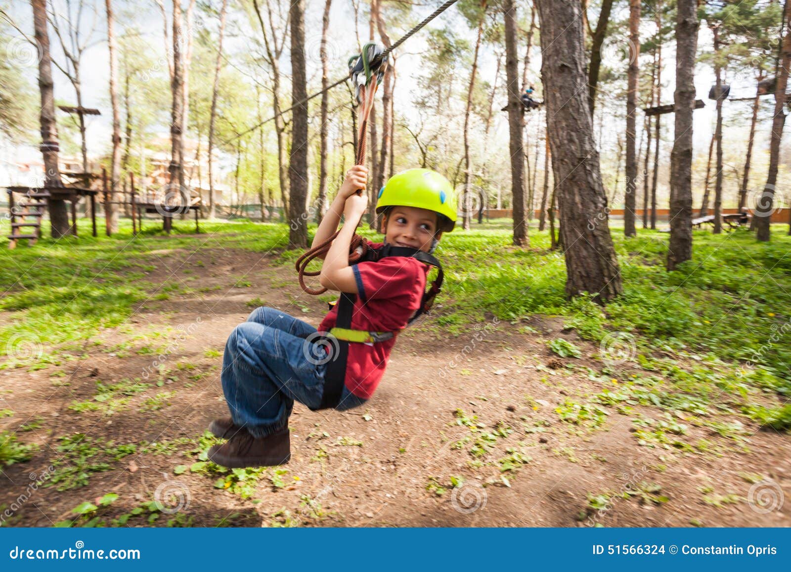 Having fun on zip line stock photo. Image of helmet, nature - 51566324