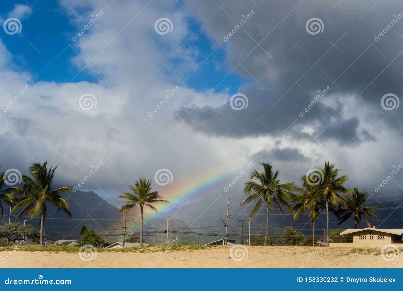 Hawaii Oahu Beach with Rainbow in the Clouds Stock Photo - Image of ...