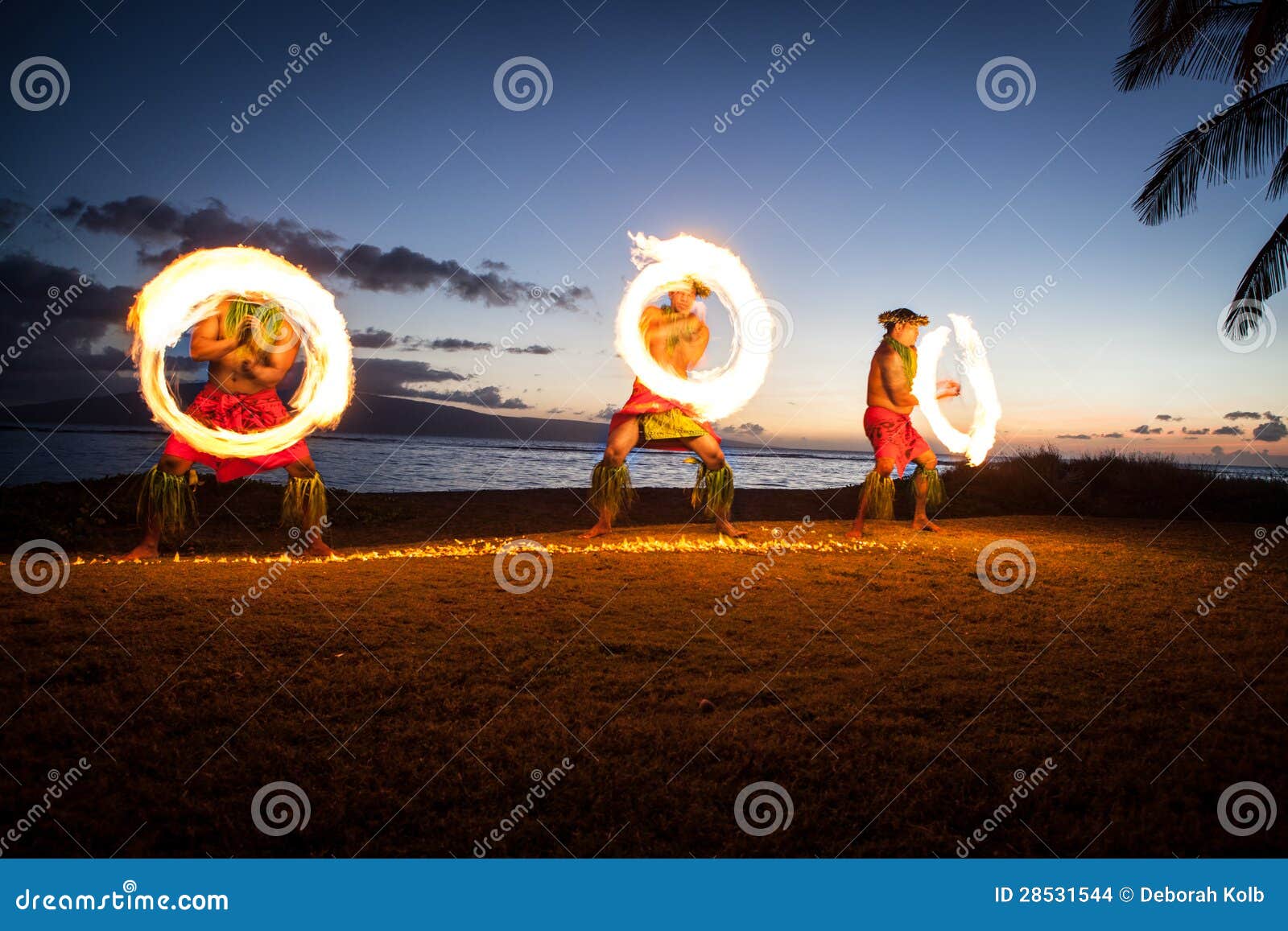 Hawaiian FIre Dancers In The Ocean Royalty-Free Stock Photography ...