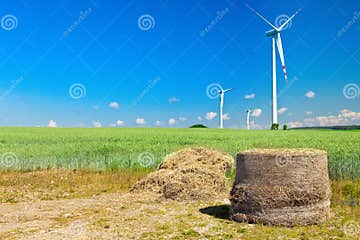 Hay Bale with Wind Turbines Stock Photo - Image of seasonal, cereal ...