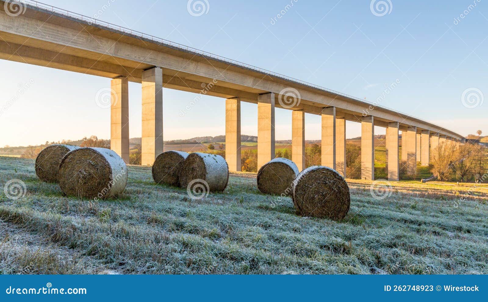 Hay Bales on the Grass Under a White Concrete Bridge in Giessen ...
