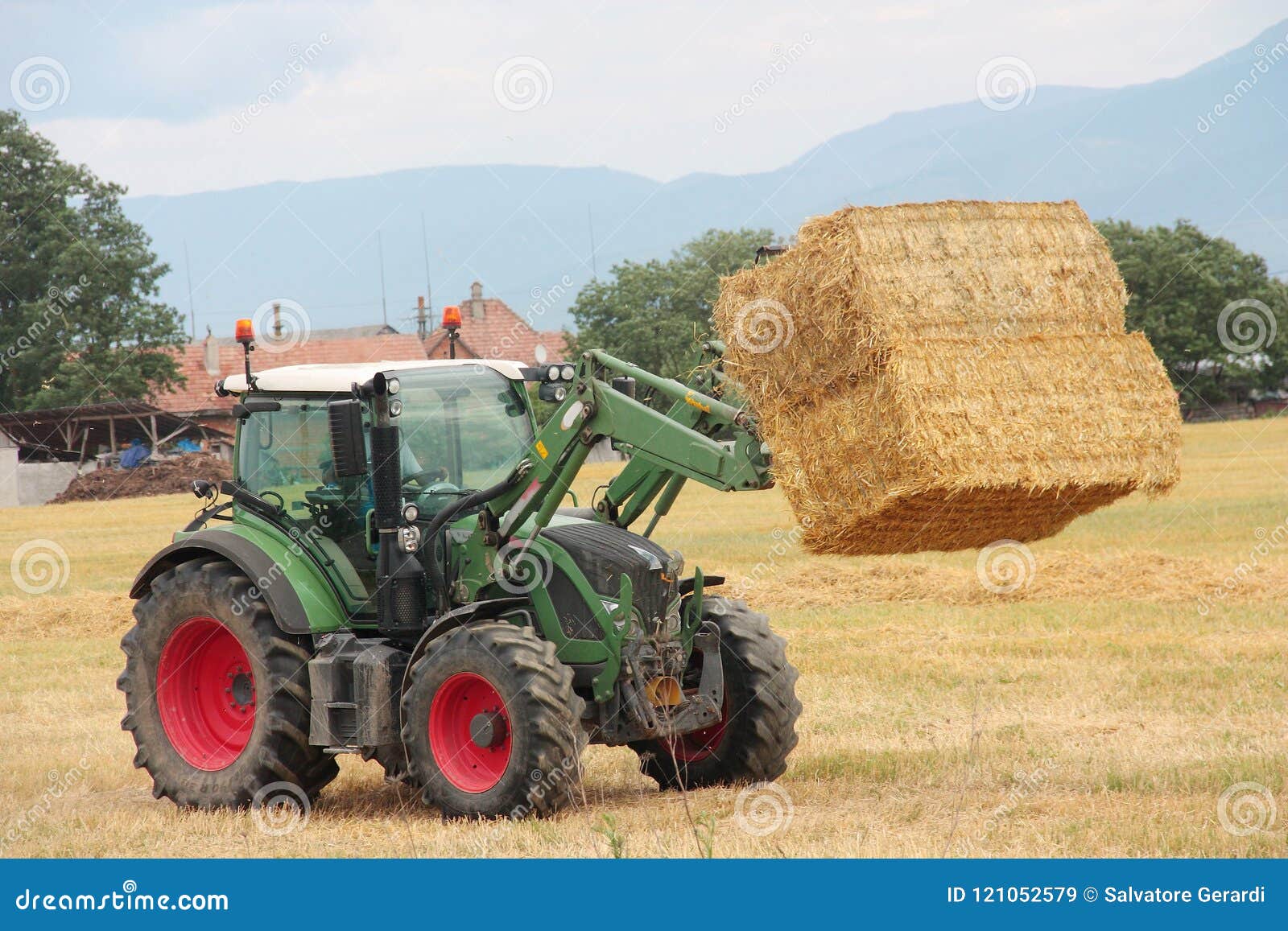 Hay Tractor Stacking Hay Bales Stock Image - Image of farmer, farmland ...