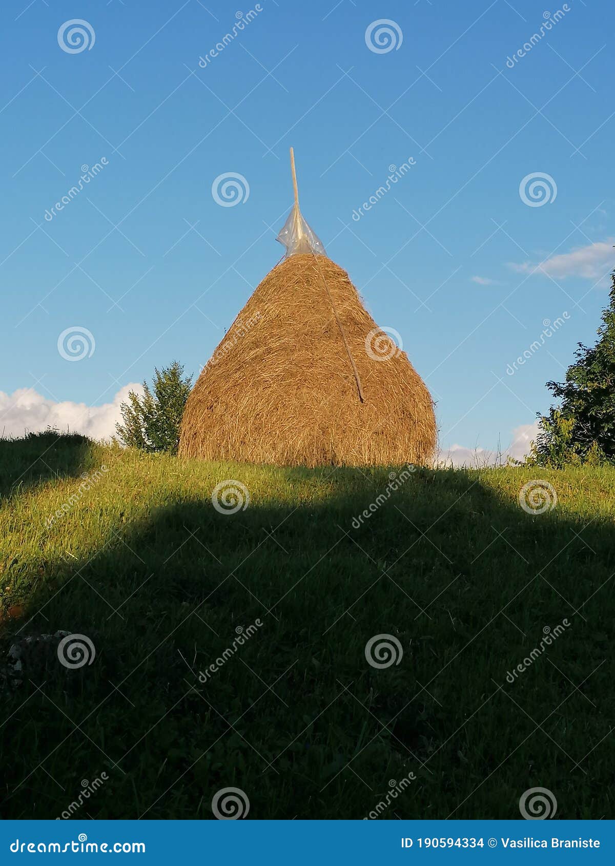 Haystack on the hill stock photo. Image of mountain - 190594334