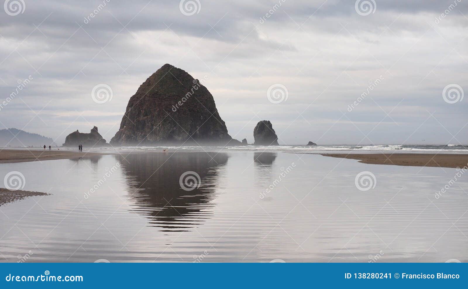 Haystack Rock on Cannon Beach, Oregon. Stock Image - Image of water ...