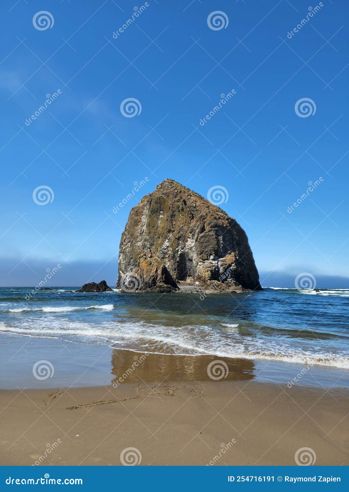 Haystack Rock on Cannon Beach in Summer Blue Sky Stock Image - Image of ...