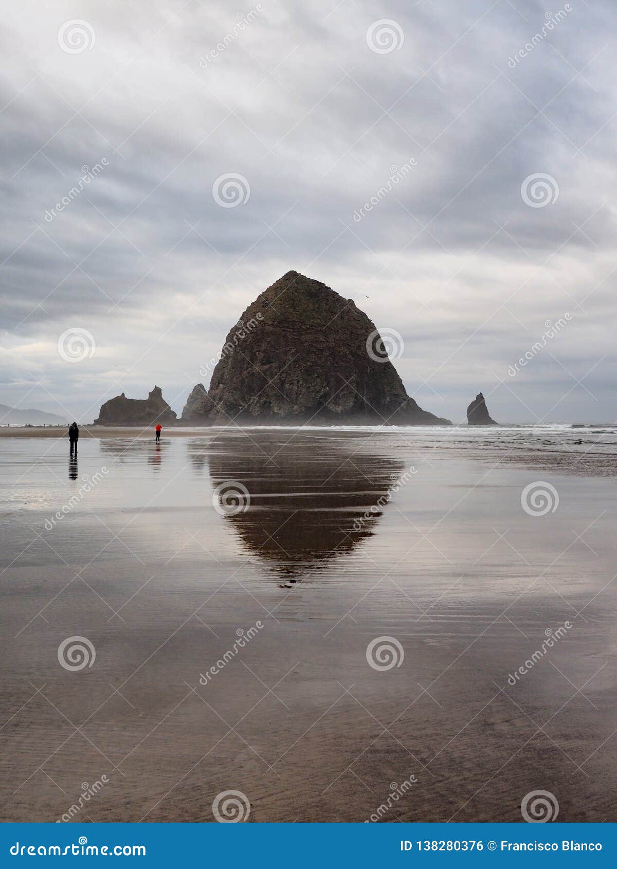 Haystack Rock on Cannon Beach, Oregon. Stock Photo - Image of seashore ...