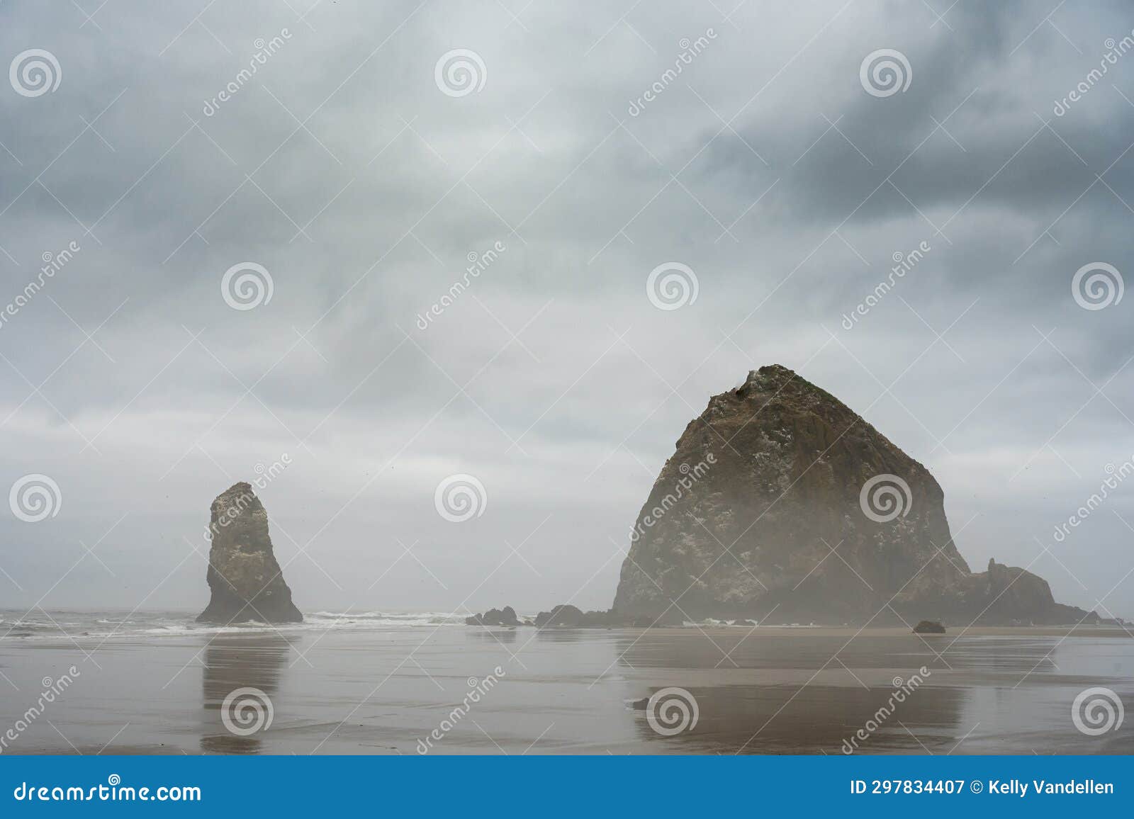 Haystack Rock in the Mist of a Cloudy Morning on Cannon Beach Stock ...
