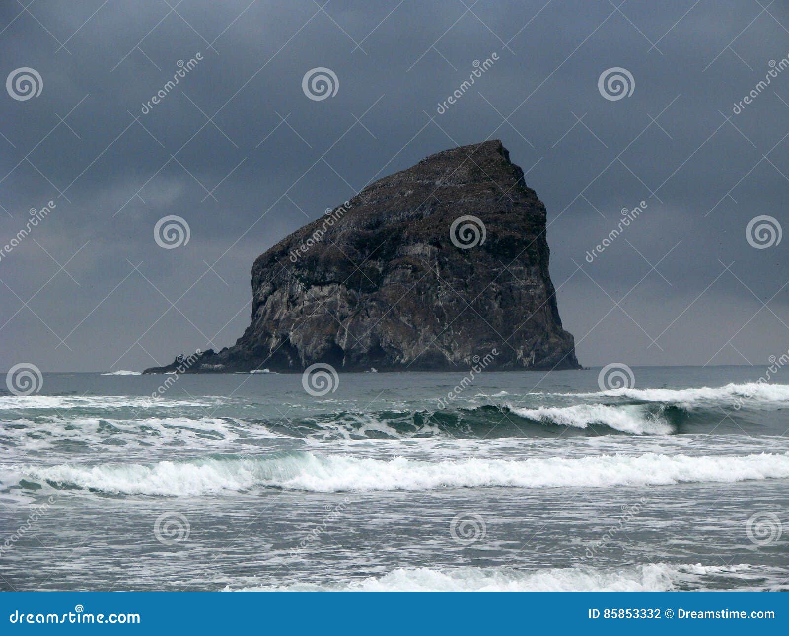 Haystack Rock stock photo. Image of clouds, coastal, oregon - 85853332